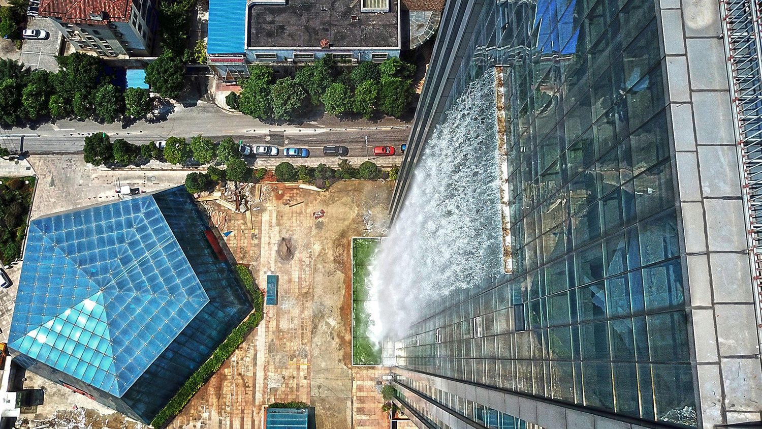 Your Office Building Isn't Cool Unless It Has a Waterfall Running Down ...