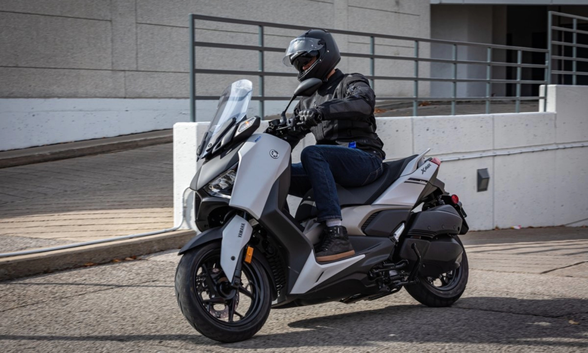 2024 Yamaha XMAX scooter for commuting with a suit and polished shoes ...