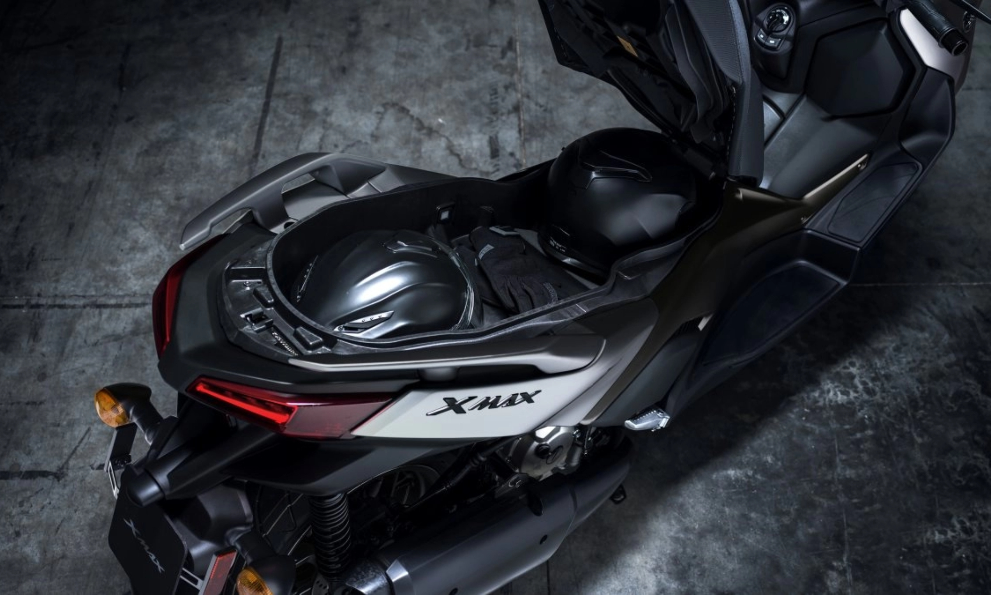 2024 Yamaha XMAX scooter for commuting with a suit and polished shoes ...
